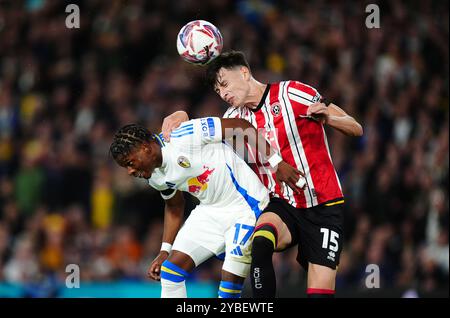 Leeds United's Largie Ramazani (left) sees his shot saved by Derby ...