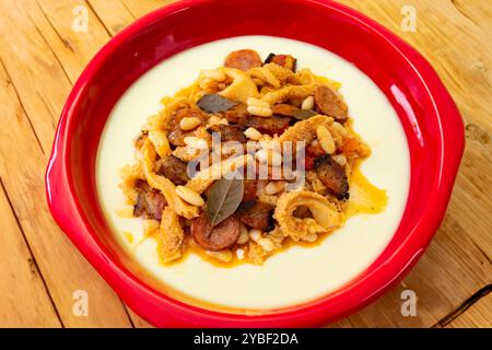Beef tripe (bucho), beef stomach, tripe on a white plate. Dobradinha ...