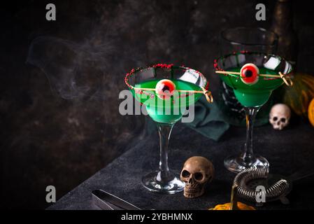 Spooky green halloween cocktails with eyeballs Stock Photo - Alamy