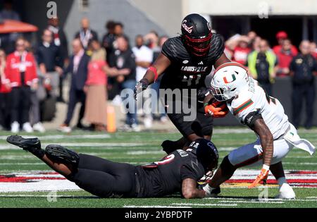 Miami running back Mark Fletcher Jr. (4) runs the ball into the end ...