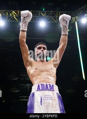 Adam Azim celebrates winning against Kurt Scoby at the Tottenham ...