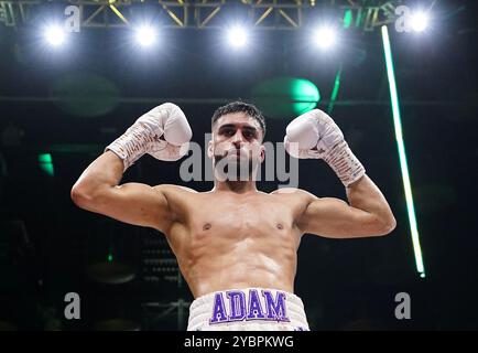 Adam Azim celebrates winning against Kurt Scoby at the Tottenham ...