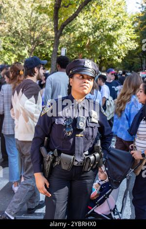 female cop police woman gives side eye in Tompkins Square Halloween Dog ...