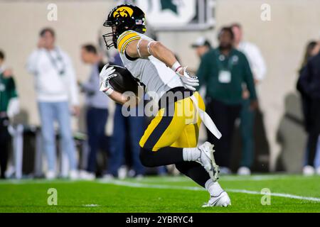 Iowa wide receiver Kaden Wetjen (21) runs for a touchdown as he returns ...