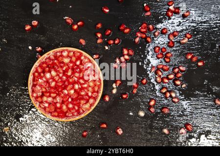Fruit of the autumn season the red seed of the pomegranate Stock Photo ...