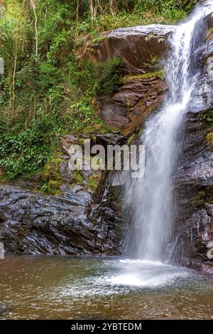 Waterfall hidden inside the rainforest Stock Photo - Alamy