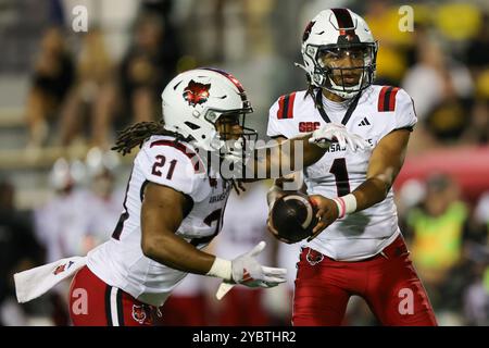 Arkansas State quarterback Jaylen Raynor (1) tries to get past Arkansas ...