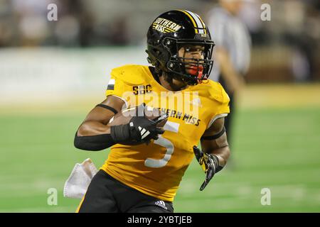 Arkansas State running back Kenyon Clay (5) is tackled by an Arkansas ...