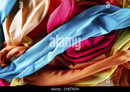 Photographic representation of a group of multicolored cloth drapes ...