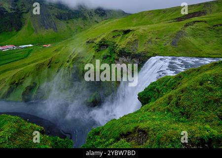 Iceland, Sudurland region, Skógar, the 60-metre-high Skógafoss ...