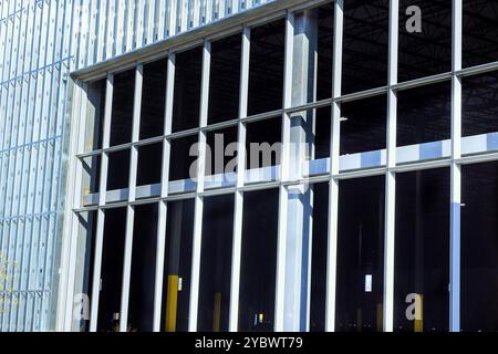 A framework of structural steel is constructed to support a wall in a ...