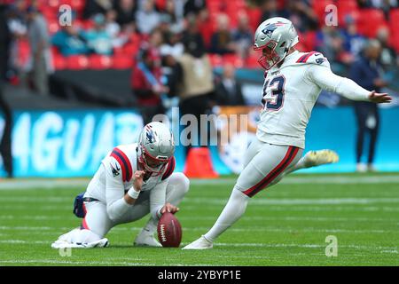 New England Patriots kicker Joey Slye (13) is congratulated after his ...