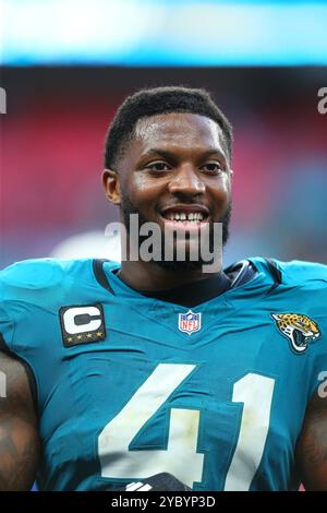 Jacksonville Jaguars defensive end Josh Hines-Allen (41) speaks at a ...