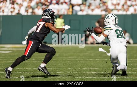 Green Bay Packers cornerback Bo Melton (16) catches a touchdown pass ...