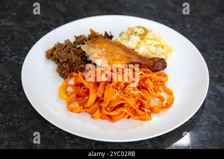 Traditional Brazilian Sunday lunch, pasta, roast chicken and mayonnaise ...