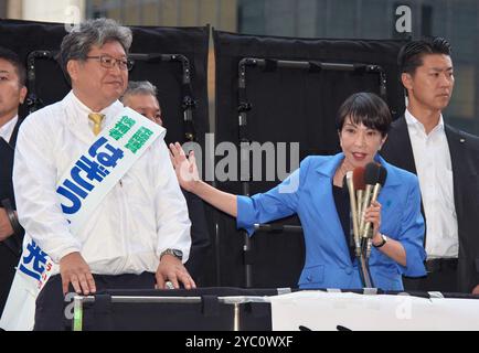 Former Economic Security Minister Sanae Takaichi raises hands during a ...