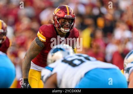 Washington Commanders linebacker Frankie Luvu (4) takes to the field ...