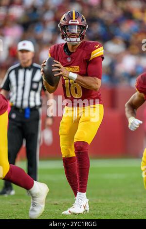 Washington Commanders quarterback Marcus Mariota (18) works out during ...