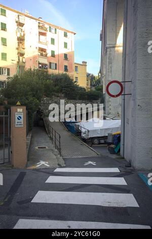 Paths leading to alley next to the pillars of a bridge Stock Photo - Alamy