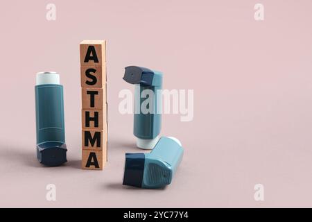 Word ASTHMA and inhalers on grey background Stock Photo - Alamy