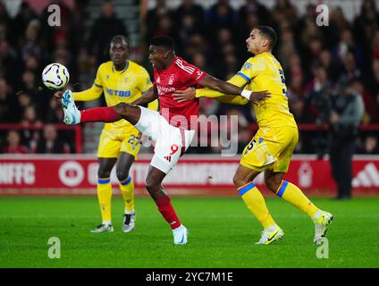 Crystal Palace's Maxence Lacroix, right, challenges for the ball with ...