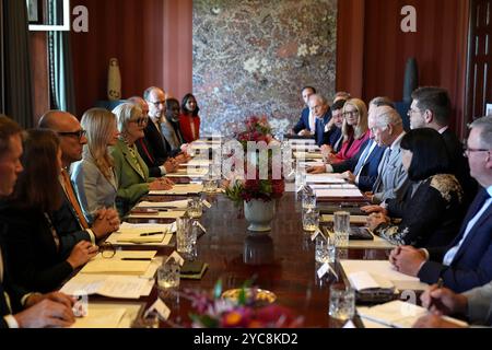 Governor General Sam Mostyn, left, greets member of parliament Allegra ...