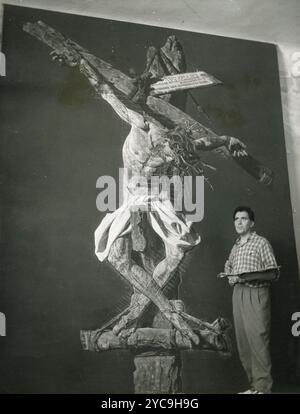 Spanish artist Benito Prieto Coussent with his painting Crucifixion ...