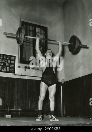 Italian weightlifter training, Italy 1950s Stock Photo - Alamy