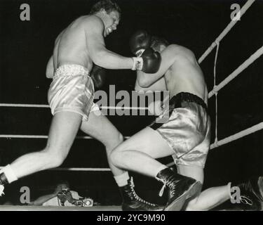 British professional boxer Billy Walker and Joe Erskine during a match ...