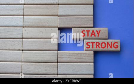 Stay strong symbol. Wooden blocks with words 'stay strong'. Beautiful ...