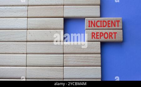 Incident Report symbol. Concept word Incident Report on wooden blocks ...