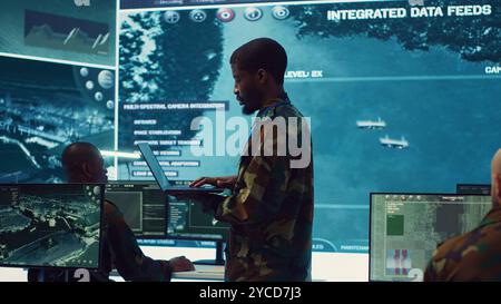 Army officer examines satellite radar footage to gather intelligence ...