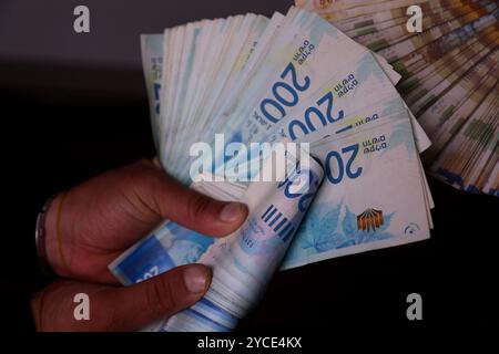 Gaza, Palestine. Israeli new shekel banknotes in different ...
