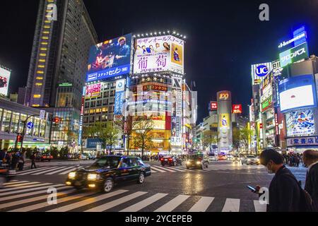 30-03-2015 Tokyo. Cityscape of Shibuya subway station. Illuminated city ...