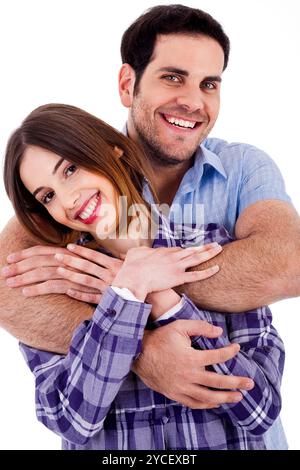 Young lovers behind hug Stock Photo - Alamy