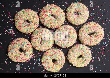 Prepared dry biscuits with sugar grains of different colors Stock Photo ...