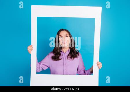Photo of dreamy funny lady dressed green shirt arm mouth looking empty ...