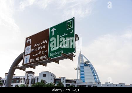 Directional road signs in Arabic and English in Jumeirah in Dubai City ...