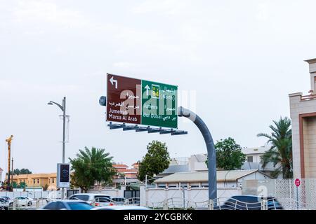 Directional road signs in Arabic and English in Dubai City, United Arab ...
