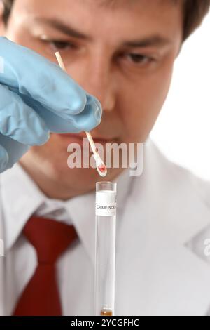 Crime Scene investigator testing a swab for blood Stock Photo - Alamy