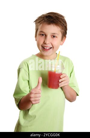 Healthy boy drinking juice thumbs up Stock Photo - Alamy