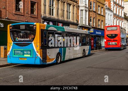 Buses stopped in the busy Drappery, Northampton, England, UK Stock ...