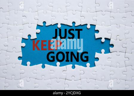 Just keep going symbol. White puzzle with words Just keep going ...