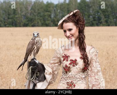 Woman Handler with Hawk Stock Photo - Alamy