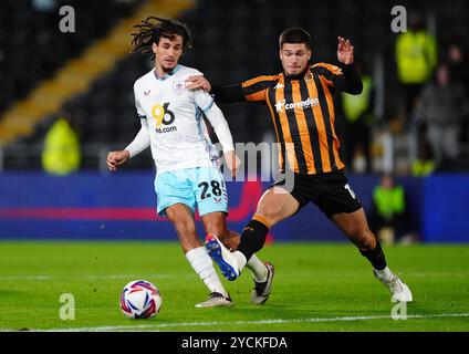 Hull City's Xavier Simons (right) during the warm up before the Sky Bet ...