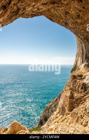 Aerial view of the Blue Cave (Grotta Azzurra) on the promontory along ...