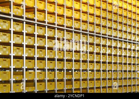 Yellow crates warehouse Stock Photo - Alamy