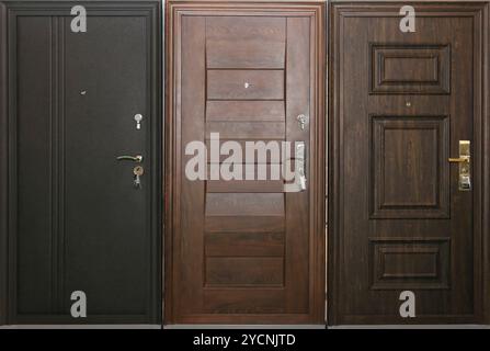 Closed Three Wooden Doors Choice in Home Interior Stock Photo - Alamy