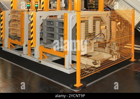 Pallet changer system in distribution warehouse Stock Photo - Alamy