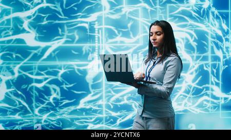 Software developer solving tasks on laptop, running artificial intelligence programming scripts ...